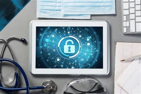 Web Security And Technology Concept With Tablet Pc On Table Stock Image