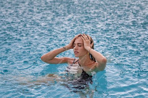 Premium Photo Rain In Summer Swimming Pool And Sexy Woman Sexy Woman