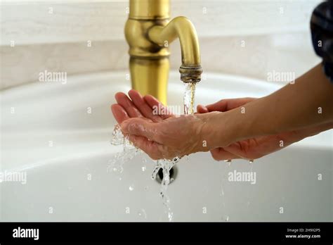 Woman Is Washing Her Hands Stock Photo Alamy