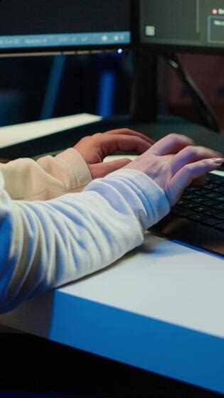 Vertical Teleworking Computer Technician Typing On Keyboard