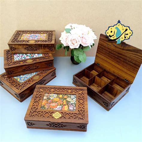 خرید و قیمت مجموعه 16 عددی جعبه 6خانه چوبی طرح متفرقه دمنوش و تنقلات صنایع دستی تامی لند از غرفه