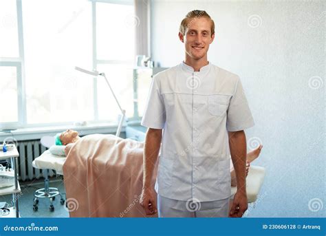 Smiling Masseur In His Cabinet Stock Photo Image Of Wellness Salon