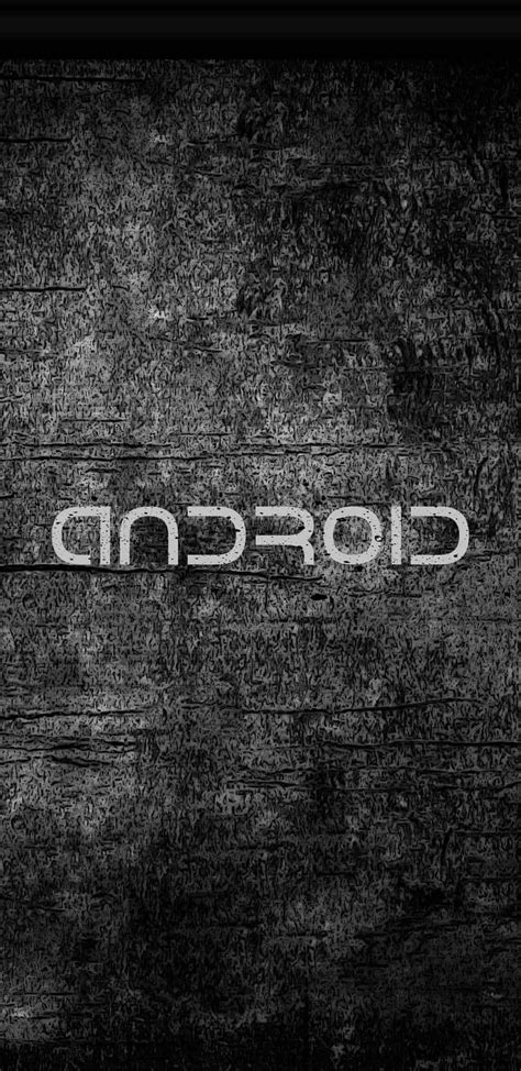 Download The Vibrant Cityscape And Mesmerizing Sunset Illumination On An Android Background