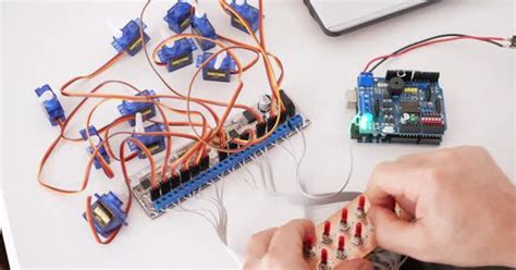 Male Programmer Creates Robotics An Arduino Board Controls Servo Motors Technology Stock
