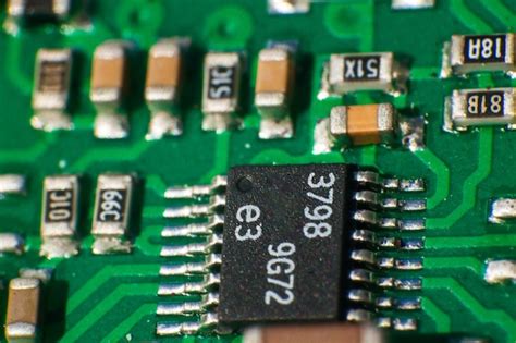 Premium Photo Computer Board With Soldered Chips And Semiconductors Closeup