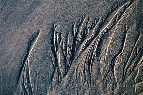 Close Up Of Erosion Markings In Sand At Low Tide By Stocksy Contributor Rialto Images Stocksy