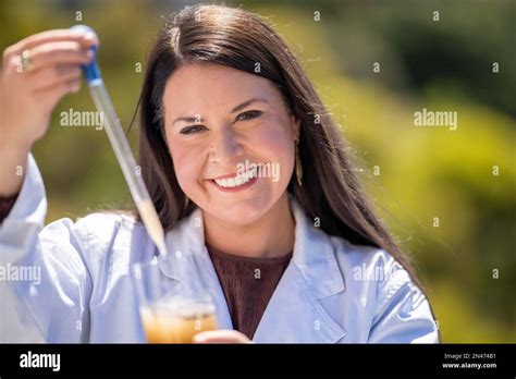 Soil Test Female Agricultural Scientist Conducting A Soil Test In A
