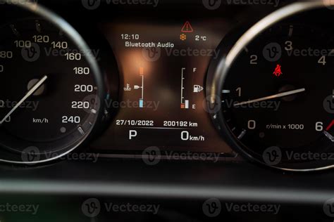 Speedometer In The Car Dashboard Indicating The Speed And Revolutions Of The Car Fuel Level