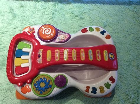 Музыкальная игрушка каталка для ребёнка 1 5 лет поёт считает на английском и испанском языке в