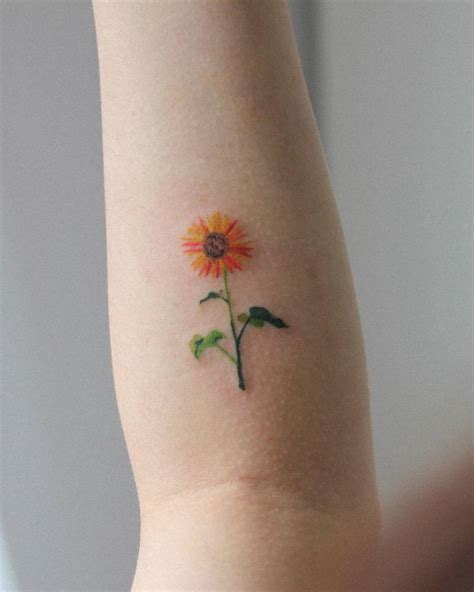 Watercolor Style Sunflower Tattoo On The Inner Forearm