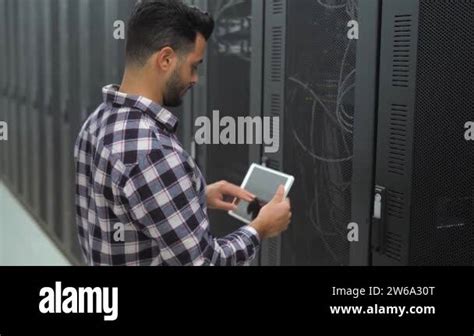 Male Informatic Engineer Working Inside Server Room Database Stock Video Footage Alamy