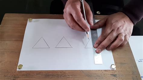 to determine angle of minimum deviation for a given prism by plotting a graph between angle of