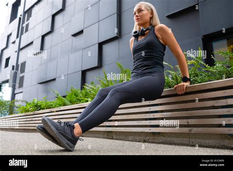 Fit Woman Doing Triceps Dips Outdoor In Modern City Stock Photo Alamy