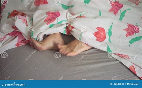Two Girl Feet In Bed Covered With Sheets And She Finishes Masturbating And Puts The Sexual