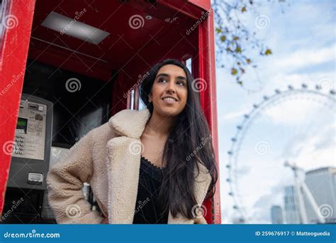 Portrait Of A Girl In London Smiling In A Telephone Box Editorial Photography Image Of