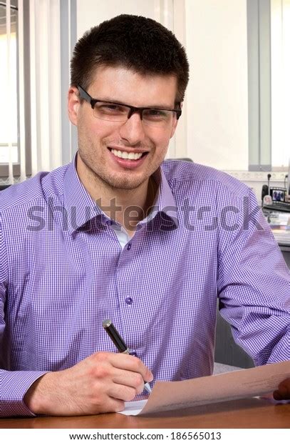 Happy Successful Businessmansigning Document Inside His Foto De Stock