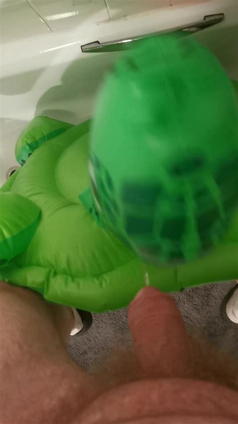 Pissing On Inflatable Turtle