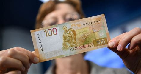 ახლადგამოშვებული 100 რუბლიანი მიმოქცევაში ვერ შედის რადგან ბანკომატი კუპიურას ვერ იღებს ტაბულა