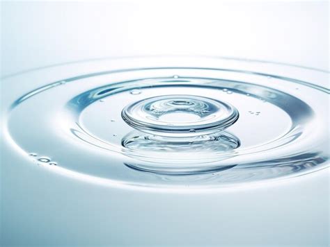Water Droplet Creating Ripples Impact And Influence Isolated On White