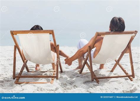 Couple Lying On Deck Chairs Stock Image Image Of Peaceful Male 32231607