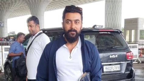 watch suriya requests paparazzi to not click his 13 year old son dev at mumbai airport
