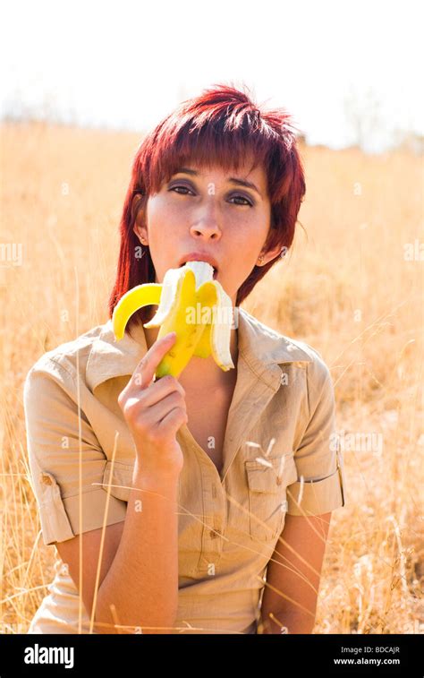 Woman Eats A Banana Fruit Stock Photo Alamy