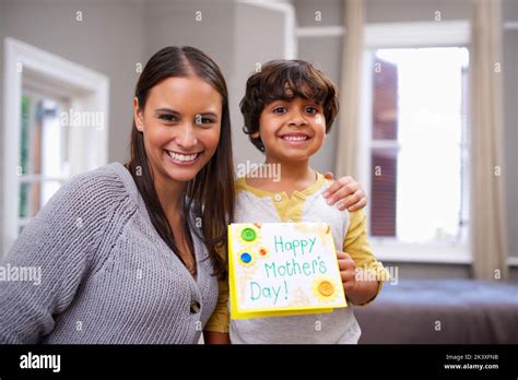 Shes The Best Mom Ever Portrait Of A Son Holding A Mothers Day Card