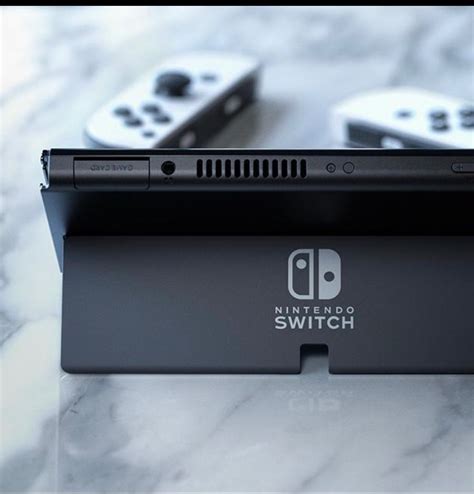 玩家将可以单独购买新型switch Oled底座 二柄app