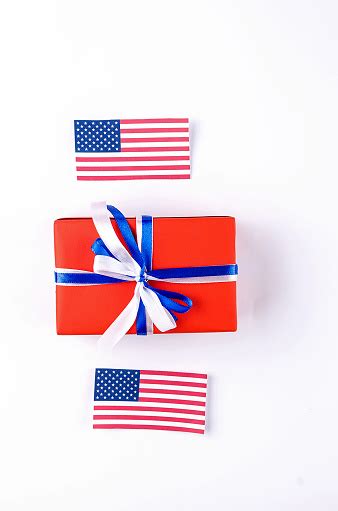 Red Blue And White T Boxes With Ribbons On A White Background Stock