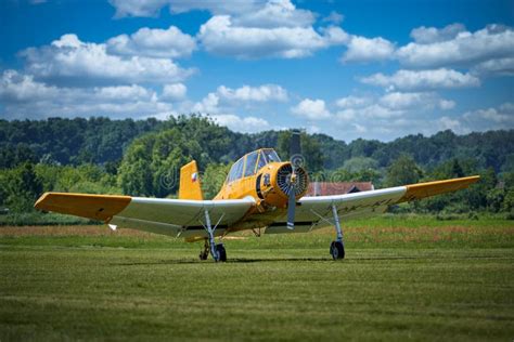 Yellow Single Engine Propeller Plane On A Grassy Field Stock Image Image Of Yellow Located