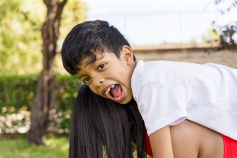 Happy Mother And Son Enjoying Together Outdoors In A Park Stock Image Image Of Enjoying