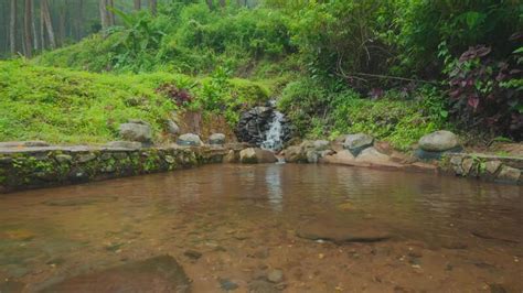 Serene Natural Hot Spring With Waterfall 48826540 Stock Video At Vecteezy