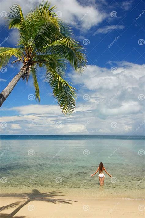 Young Woman In Bikini Standing In Clear Water Nananu I Ra Island Fiji