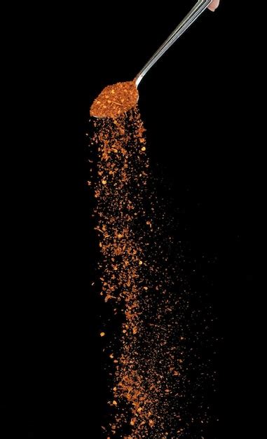Premium Photo Red Hot Chilli Flying Explosion Red Grain Chilli Explode Abstract Cloud Fly Seed