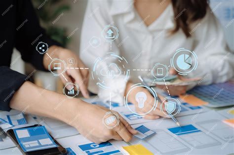 Premium Photo Ui Designer Brainstorming About Mobile App Interface Wireframe Design With