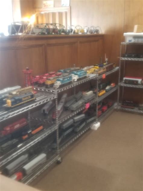 Toy Trains On Shelves In Room