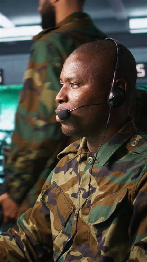 Vertical Army Telecommunication Systems Operator Using Radio Gear