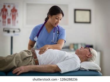96 423 Female Nurse Examining Naked Men Women Royalty Free Images