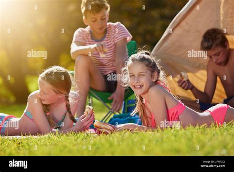 Lazy Summer Days With My Friends A Group Of Young Friends Hanging Out At Their Campsite Stock
