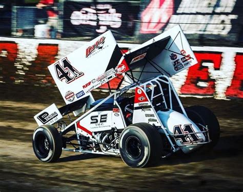 Sprint Cars Racing On Dirt Track