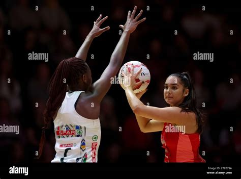 Englands Ellie Rattu Right In Action Against Bongiwe Msomi During The Vitality Netball