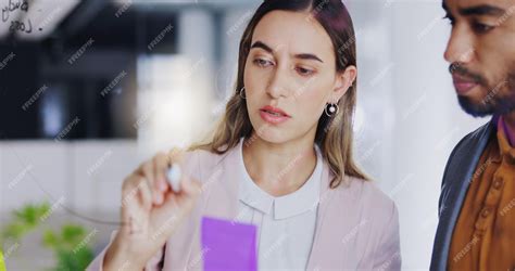 premium photo business woman man and glass for writing sticky note and notes with talking