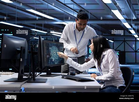 team of technicians doing maintenance on server hub to optimize it for