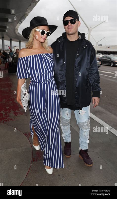Paris Hilton And Fiance Chris Zylka Depart From The Airport Featuring Paris Hilton Chris Zylka