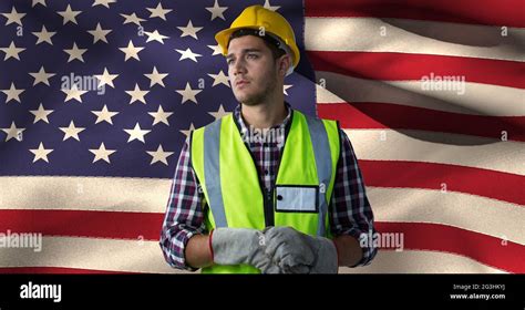 Composition Of Male Construction Worker Over Billowing American Flag