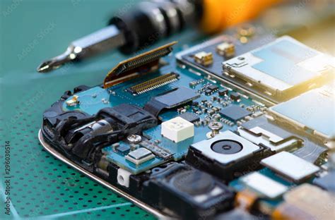 Closeup Image Of Motherboard Of Mobile Smart Phone And Screwdriver Stock Photo Adobe Stock
