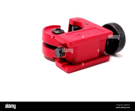 Picture Of Red Mini Pipe Cutter That Usually Used By Technician To Cut Small Pipe Shoot On