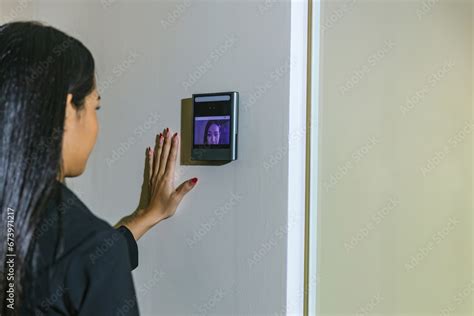 Woman Using Face Scanner To Unlock Door In Office Building Access Control Facial Recognition