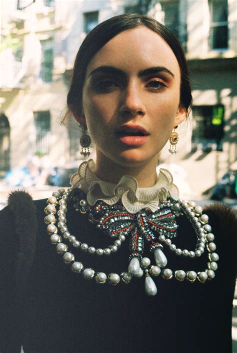 Zoe Bleu Sidel 21 In A Gucci Knit Top With An Embroidered Necklace