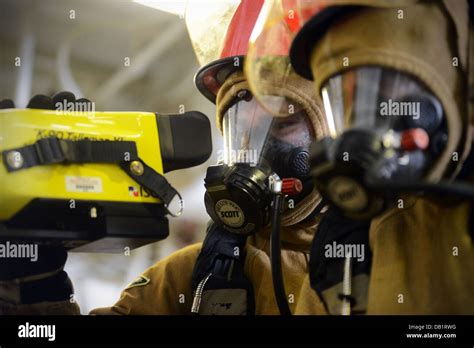 Hull Maintenance Technician 3rd Class Timothy Dunkel Uses A Thermal